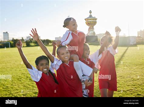 Sports Soccer And Young Girls With Trophy Celebrate Happy And Excited