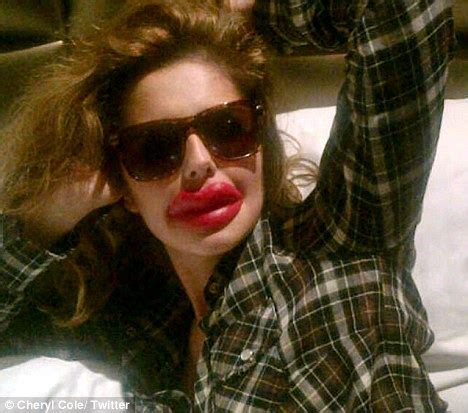 Cheryl Cole Shows Off Huge Lips In La Poking Fun At Plastic Surgery Daily Mail Online