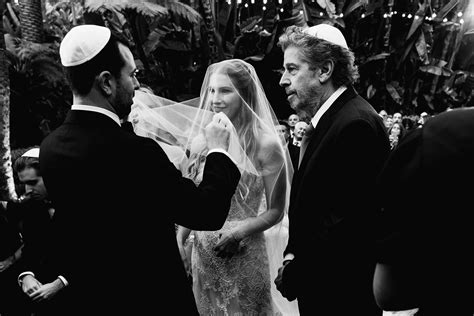 Groom Lifts Brides Veil At Jewish Wedding Photo By John And Joseph