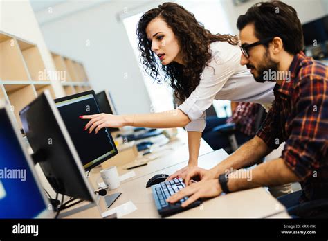 software engineers working on project and programming in company stock