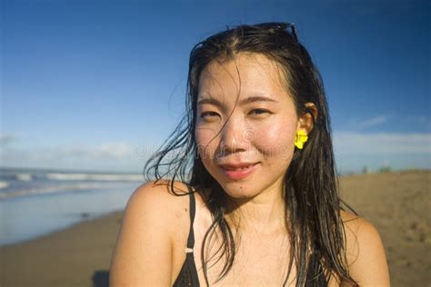 Beautiful Asian Woman Enjoying Sand And Sea Young Happy And