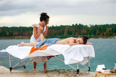Premium Photo An Attractive Caucasian Woman Lying Down On A Massage