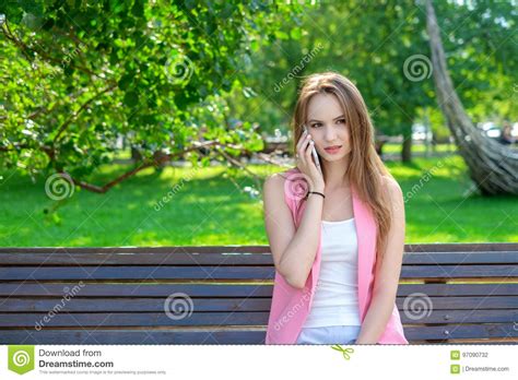 Portrait Of An Attractive Young Professional Woman Using A Smartphone