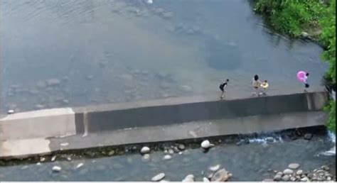 驚險︱廣西男子玩無人機發現山洪 一路狂奔救下玩水母子3人 多倫多 加拿大中文新聞網 加拿大星島日報 Canada Chinese News