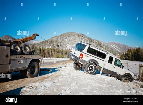 Chevy Pulling Ford Out Of Ditch