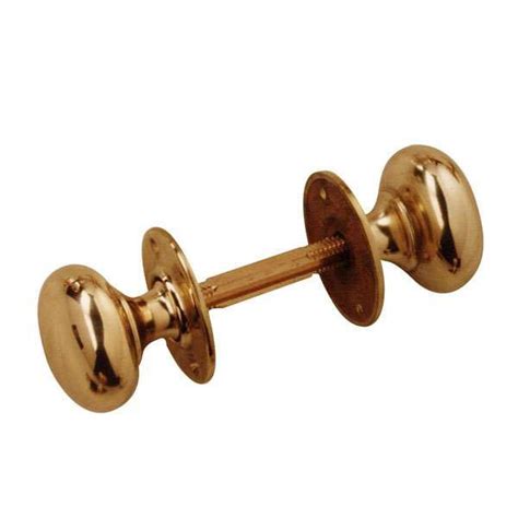 Bun Door Knobs Polished Brass Lacquered Broughtons Lighting And Ironmongery