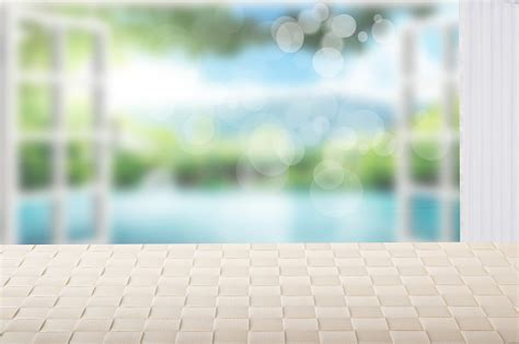 써니 비치 배경에 테이블 탑입니다 푸른 하늘 및 Bokeh 빛 흐리게 추상 해변에 빈 밝은 테이블 제품 디스플레이 몽타주에 대