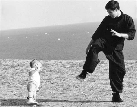 20 Adorable Photos Of Bruce Lee Teaching His Son Brandon Lee Some Moves