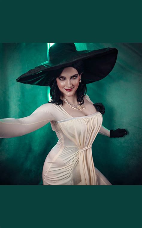 Beautiful Lady In White Dress And Black Hat