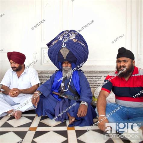 Nihang Sikh Sitting In Traditional Religious Clothing Golden Temple