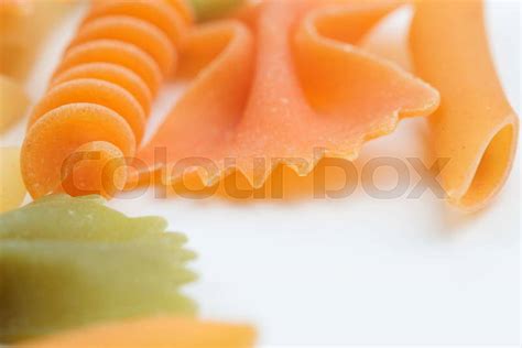 Tricolor Macaroni Of Different Types It Is Located On A Whi Colourbox