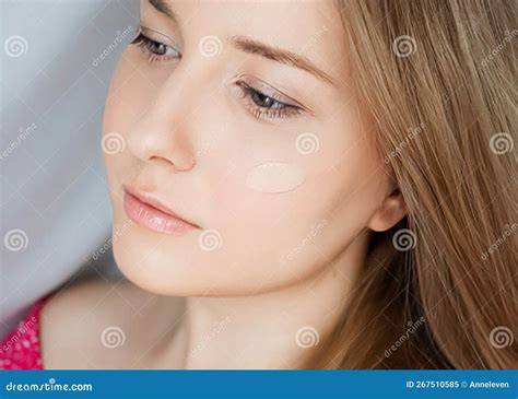 Beautiful Woman With Liquid Make Up Foundation On Her Skin Stock Image