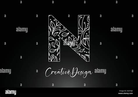 Elegant Letter N Logo Made Of Flowers With Leafs And Floral Pattern