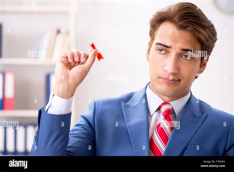 Man Throwing Dart At Dart Board Hi Res Stock Photography And Images Alamy