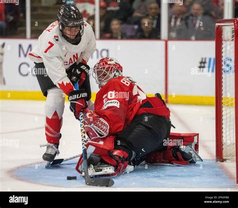Switzerland Goaltender Andrea Braendli 20 Makes A Save On Canada