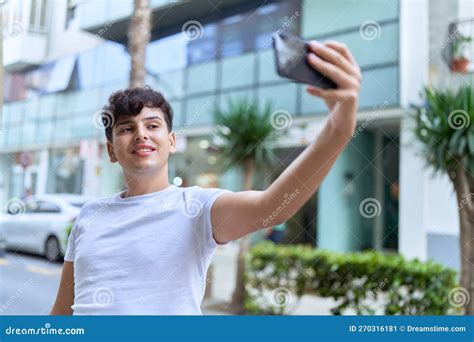 Non Binary Man Smiling Confident Making Selfie By The Smartphone At Street Stock Image Image