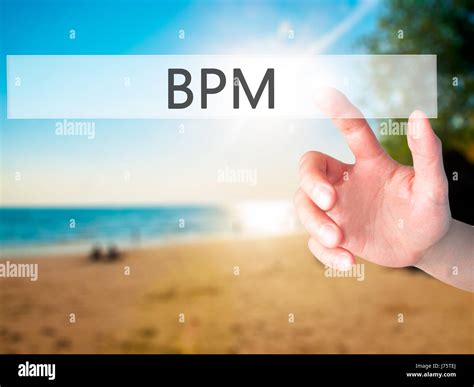 Bpm Business Process Management Hand Pressing A Button On Blurred
