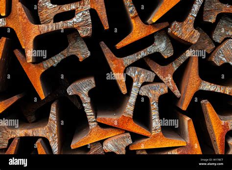A Stack Of Scrap Flat Bottomed Rail In A Large Pile Awaiting Recycling