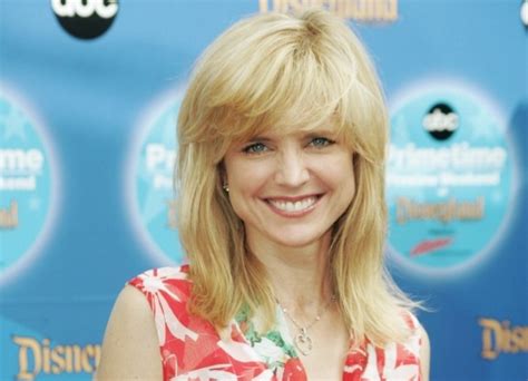 Courtney Thorne Smiths Shoulder Long Hairstyle With Feathered Bangs