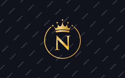 Золотая корона буква N Бренд корона круг монограмма Премиум векторы