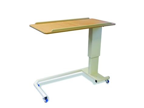 B430 Rise And Fall Table With Wheelchair Base From Cefndy Healthcare