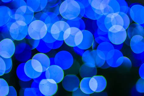 아름 다운 블루 Bokeh 추상적인 빛 배경입니다 멋진 Defocused 추상 블루 크리스마스 배경입니다 소음 곡물와 가난한 빛