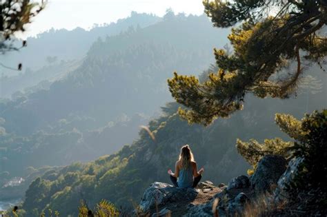Premium Photo A Person Meditating In A Serene Natural Setting