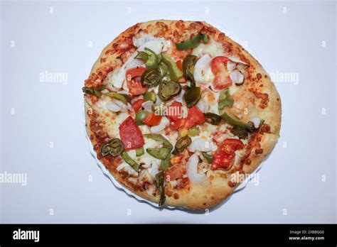 Delicious Dominos Pizza Named Veg Extravaganza Pizza With Topping Of