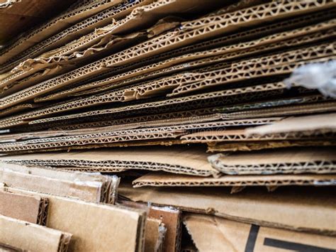 Cardboard Boxes Stacked On Top Of Each Other A Lot Of Cardboard Is Prepared For Disposal Stock