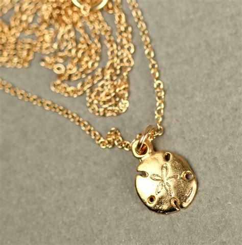 Gold Sand Dollar Necklace Delicate Necklace A Tiny 22k Gold Overlay