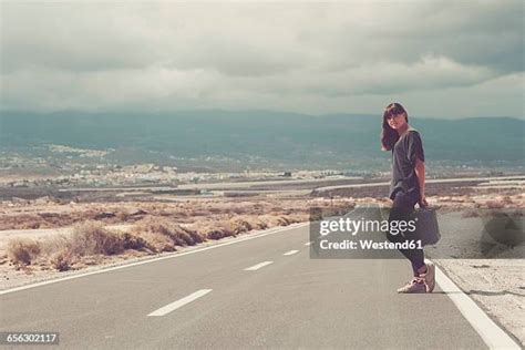 Hitch Hiking Woman Photos And Premium High Res Pictures Getty Images