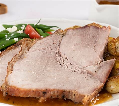 Cerdo A La Naranja Con Salsa De Durazno