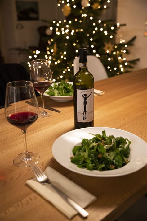 Green Wine Bottle Beside Wine Glass On Table Photo Free Wine Image On