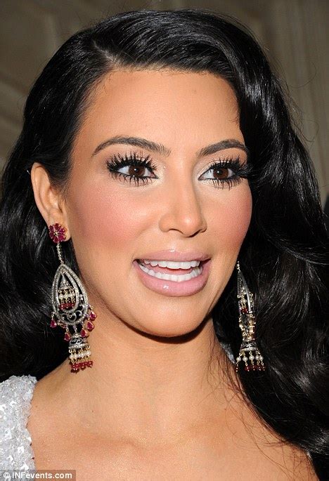 Kim Kardashian Glams Up For Vegas New Years Bash With Suspiciously
