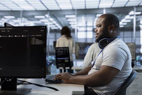 Engineer Managing And Optimizing Data Center Infrastructure Stock Image Image Of Maintenance