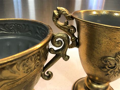 Rare And Stylish Set Of 2 Rustic And Decorative Metallic Gold Trophy Style