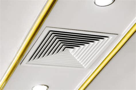 Premium Photo Square Ventilation Grill On The Ceiling Next To A Spotlight