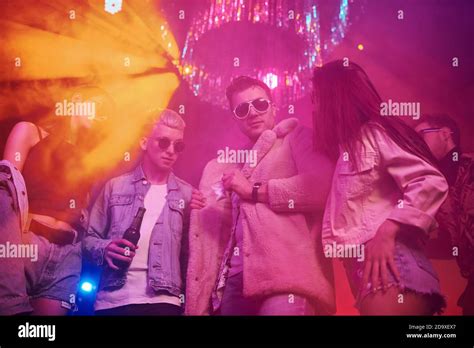 Buying Drugs Young People Is Having Fun In Night Club With Colorful