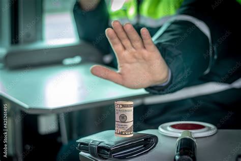 Street Lighting A Special Car Inspector Shows A Hand Gesture On The