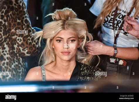 Model Devon Windsor Gets Her Hair And Makeup Done Backstage Before The