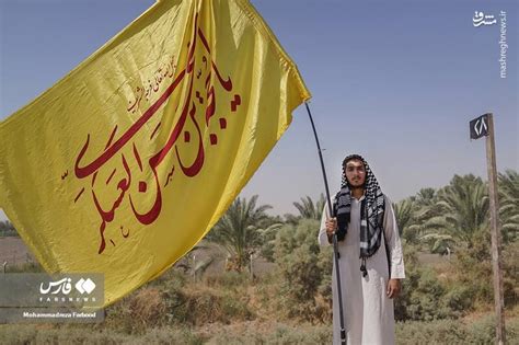 مشرق عکس زیر بیرق حسین ابن علیع صاحب‌خبر