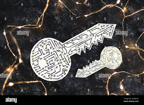 Big And Small Encryption Key Icon Made Of Circuits And Led Lights Side By Side On Dark
