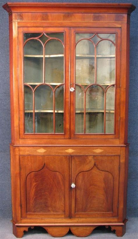 Stylish And Space Saving The Tall Corner Cabinet With Glass Doors