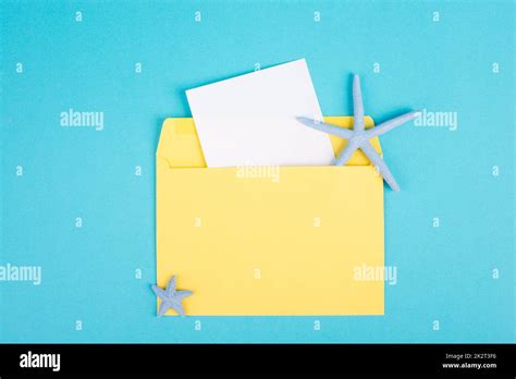 Blue Colored Summer And Vacation Background Sea Star In An Envelope