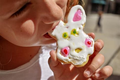 Premium Photo Close Up Of Girl Eating Cookie