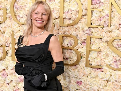 See Pamela Andersons Dramatic Haircut Debut At The Met Gala
