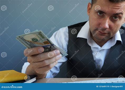Personal Loan Concept Man Offers Money In The Office Stock Image