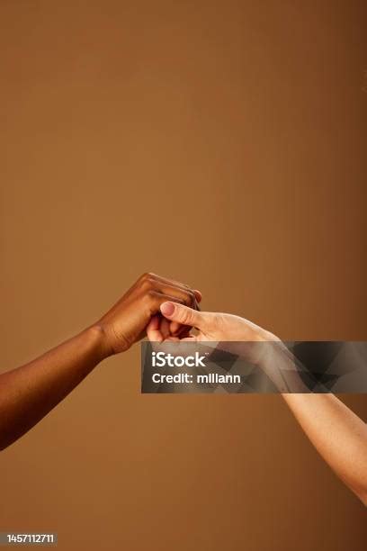 Cropped Picture Of A Multicultural Girls Touching Each Other Hands