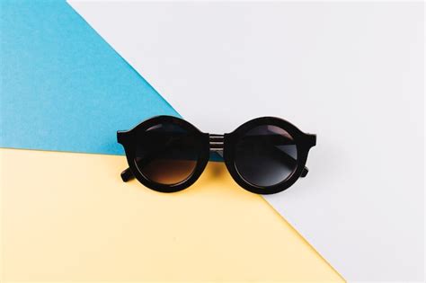 Premium Photo Round Sunglasses On Colorful Background