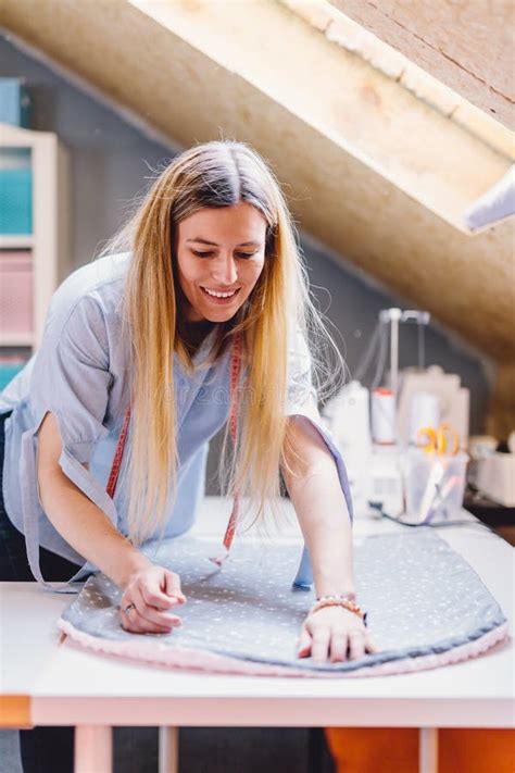 Seamstress Woman Working With Cloth In Clothes Sewing Workshop Stock